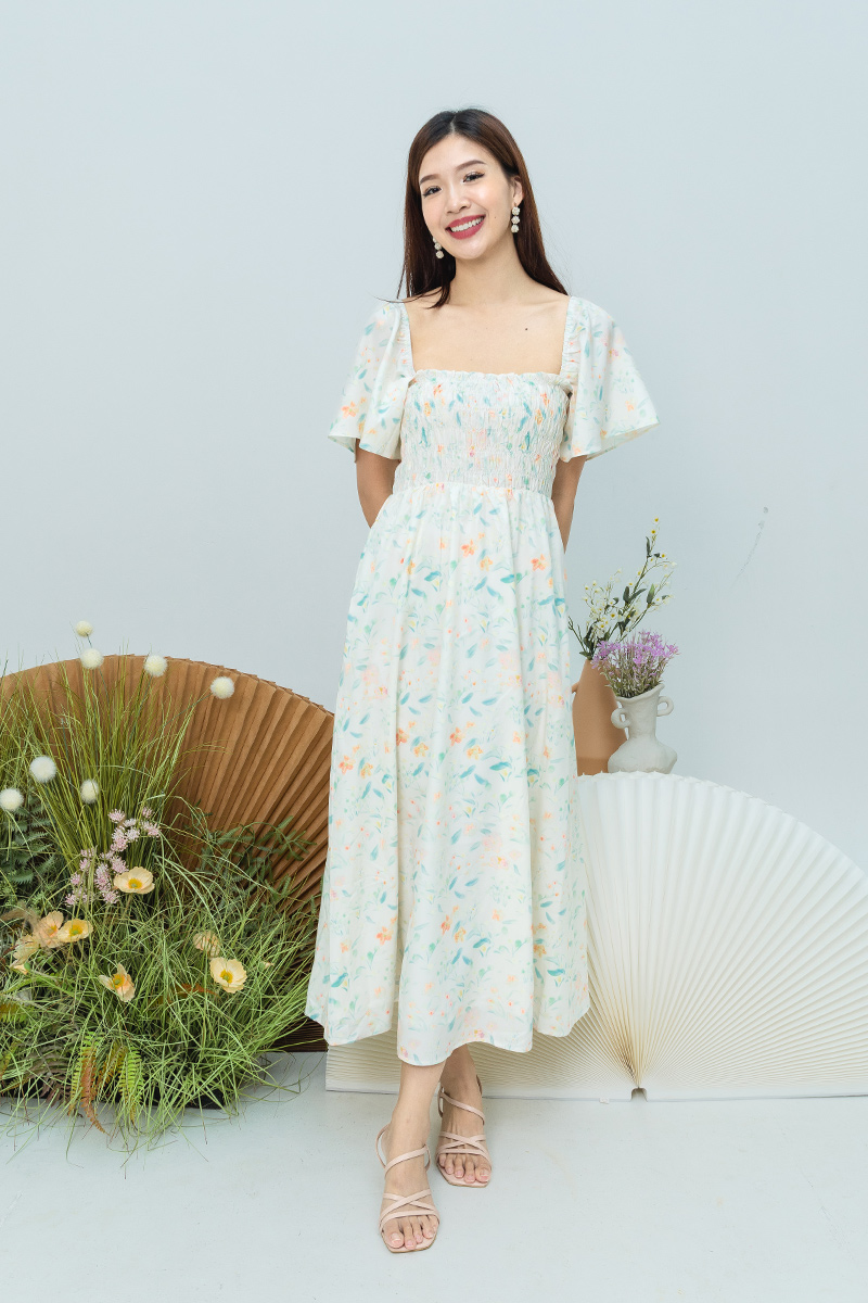 Aria Multi-Way Smocked Dress in Sunset Florals | FlymetoParis